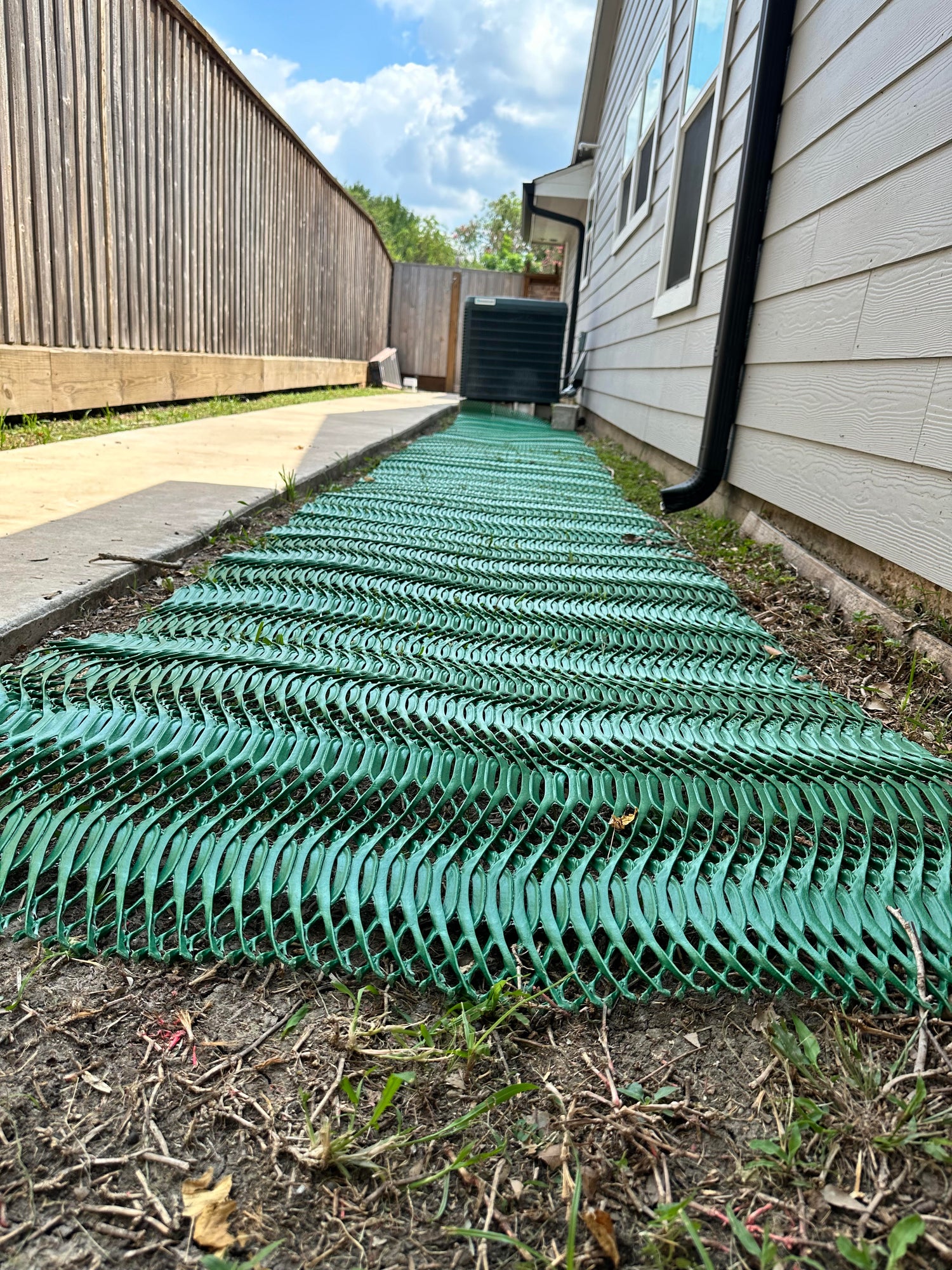 Residential Grass Mesh Installation | Mud Control Near House – RutGuard